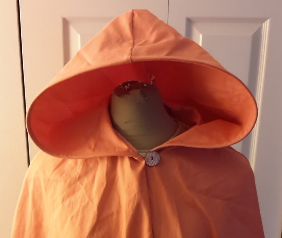 Orange Rain Cloak | Tastefully Timeless